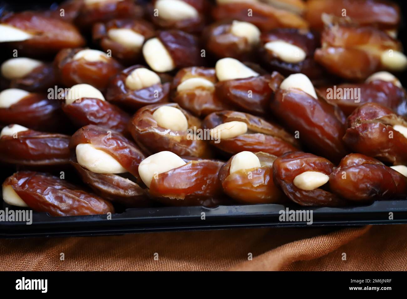 Dates with nuts inside. Oriental sweets Stock Photo - Alamy