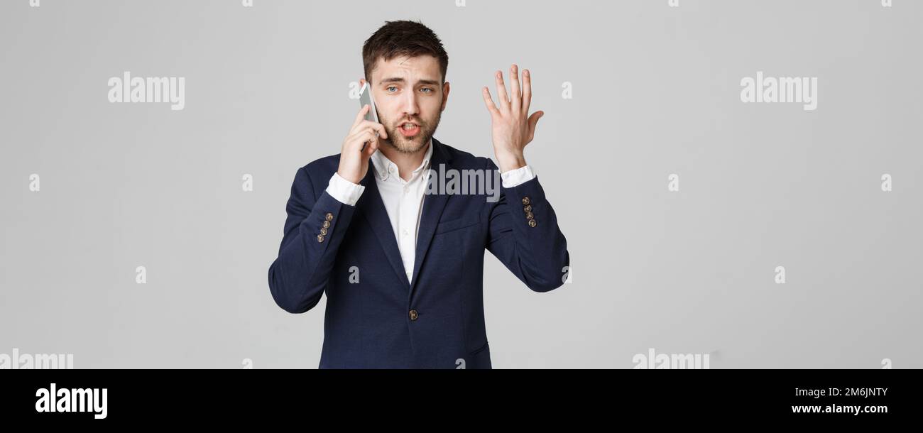 Business Concept - Portrait young handsome angry business man in suit ...