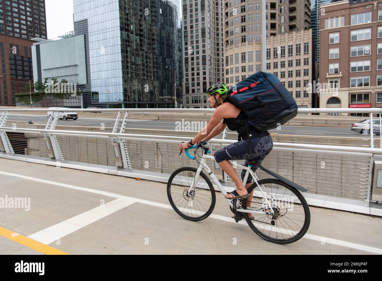 Woman cycling urban helmet hi-res stock photography and images - Alamy