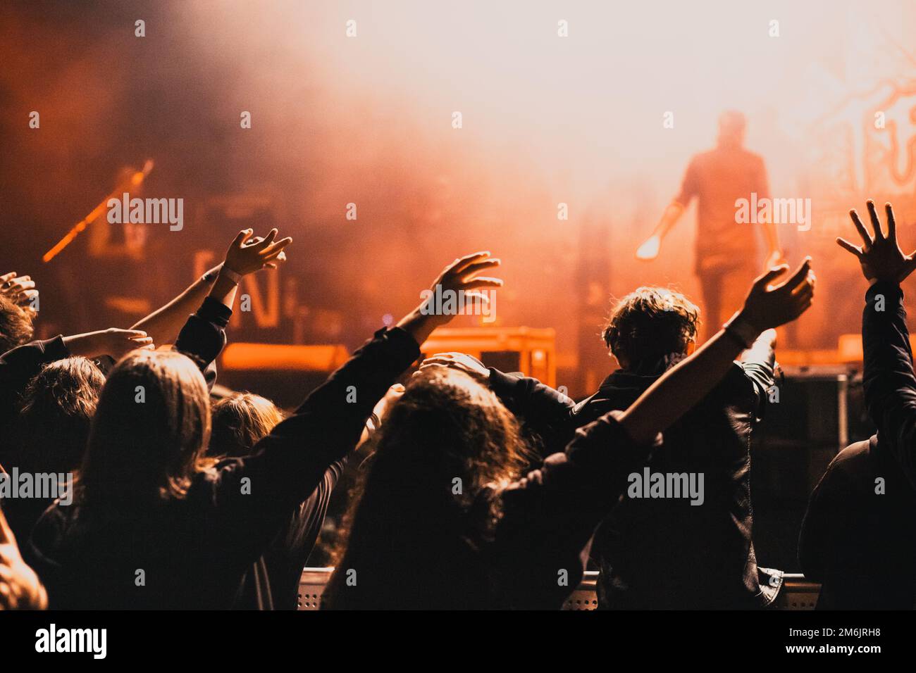 Crowd at concert and silhouettes in stage lights Stock Photo - Alamy