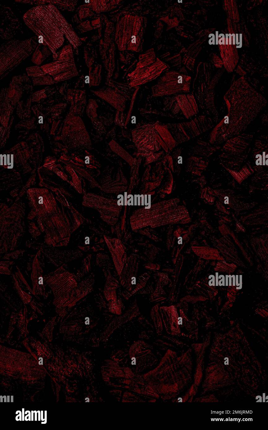 Charcoal with red streaks of heat. Textured dark red background Stock ...