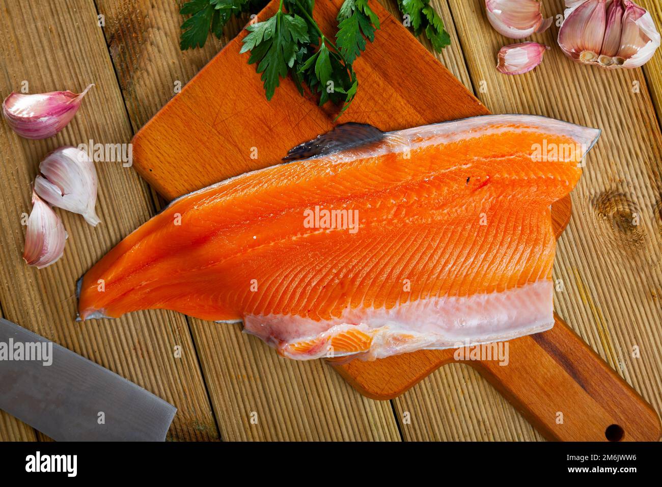 Raw trout fillet with condiments Stock Photo - Alamy