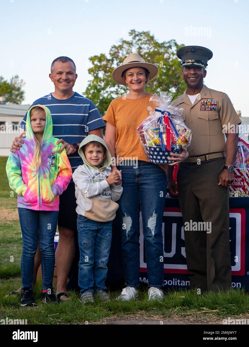 The Boesch Family poses for a group photo with U.S. Marine Corps Col ...