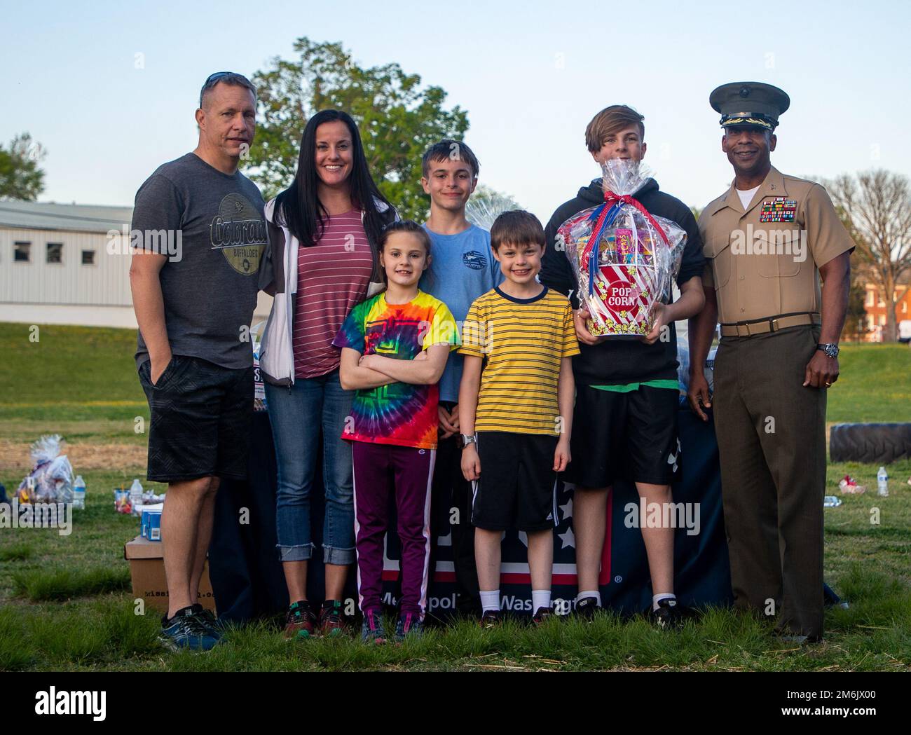 The Wickham Family poses for a group photo with U.S. Marine Corps Col ...
