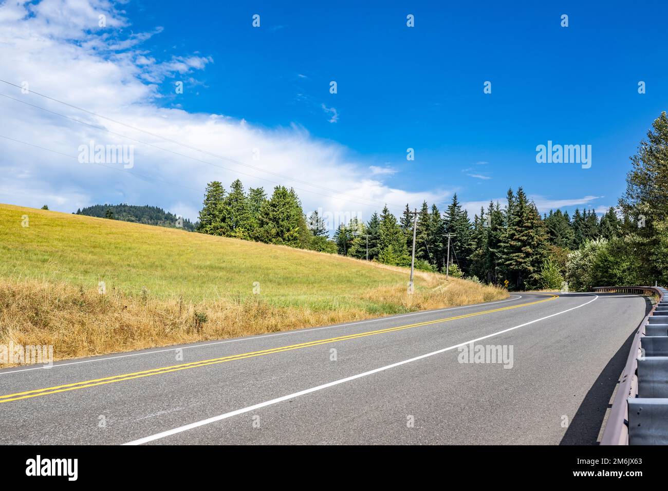 Scenic summer landscape with a winding mountain highway road with ...