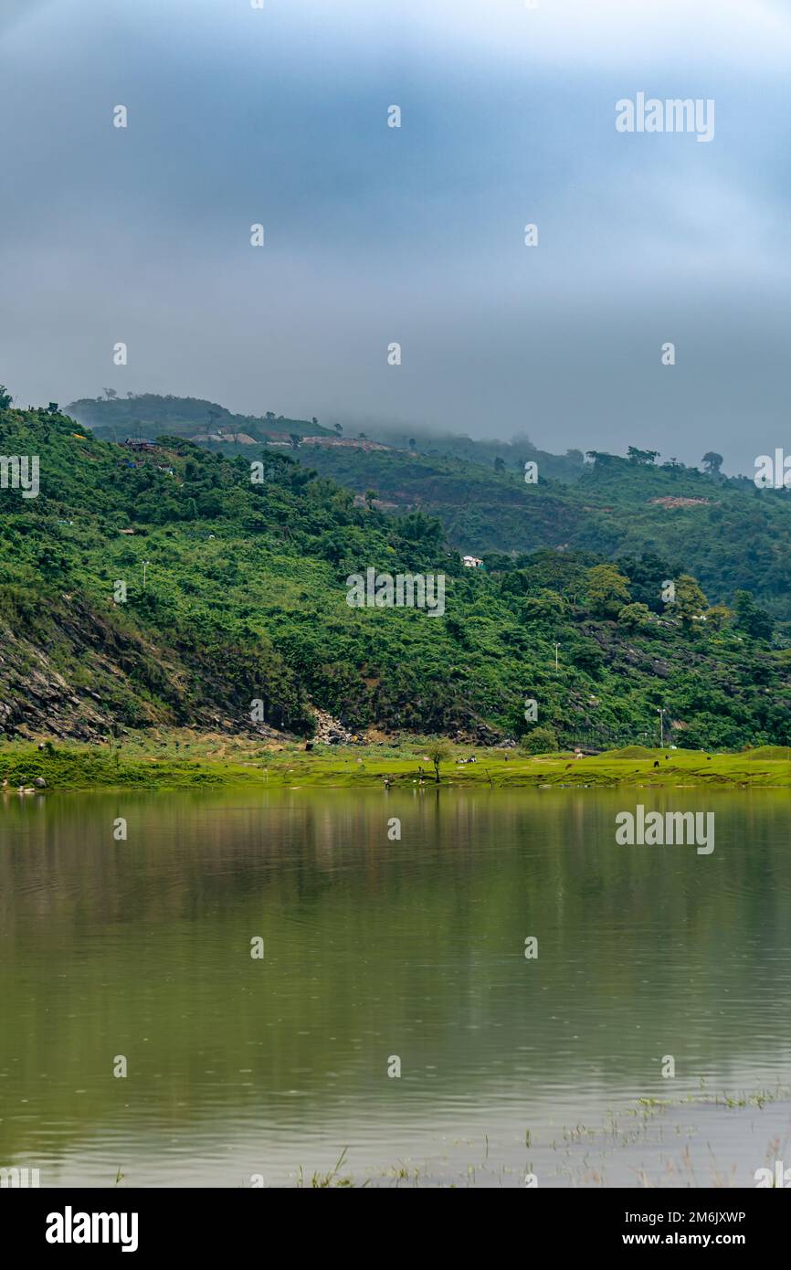 Natural landscape with lake and mountains at Niladri Lake Sunamganj ...