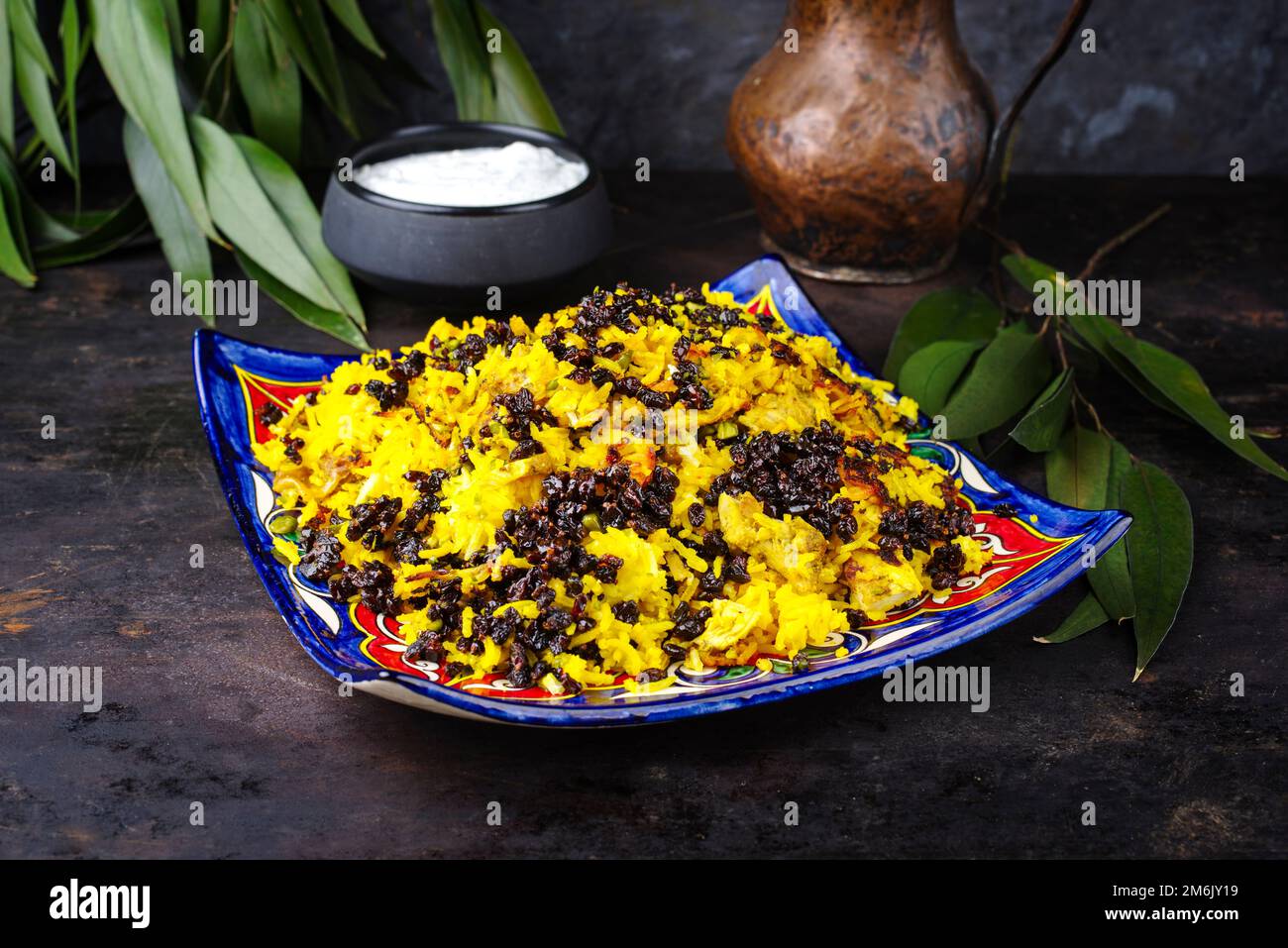 Traditional Persian zereshk polo with saffron rice and berberis served ...