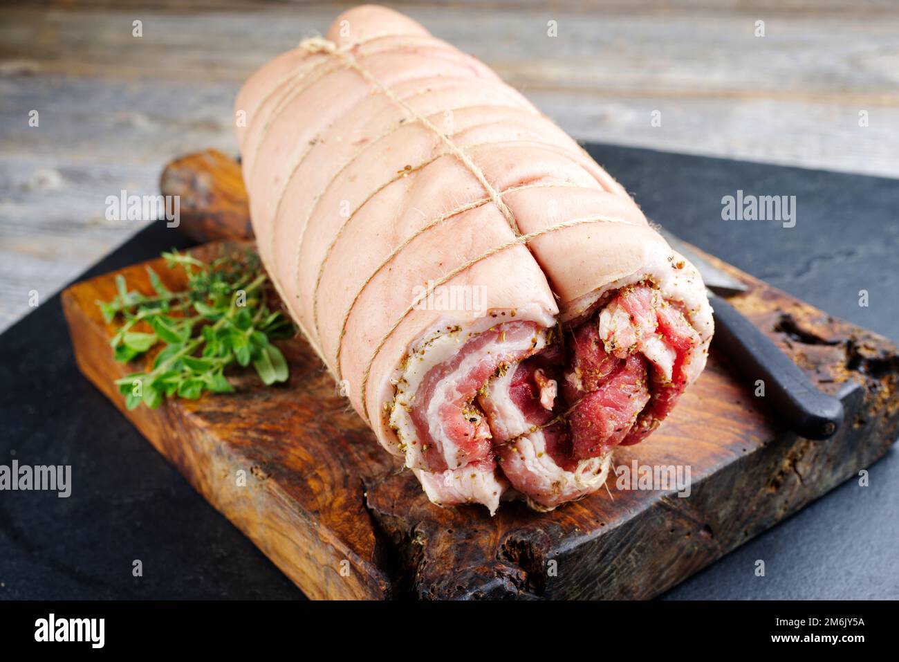 Traditional raw Filipino lechon kawali pork belly roll meat as piece ...