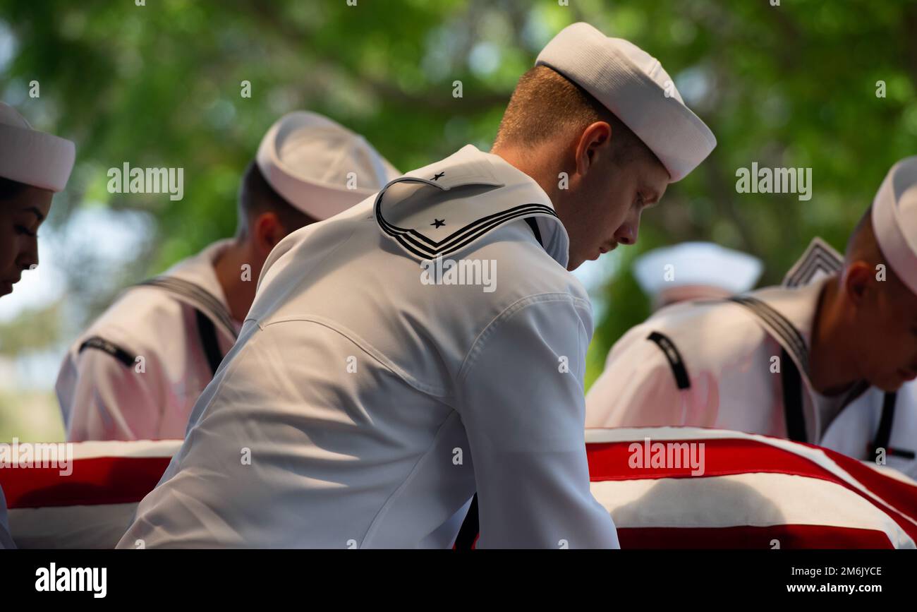 U.S. Navy pallbearers transport U.S. Navy Seaman 2nd Class Walter R ...