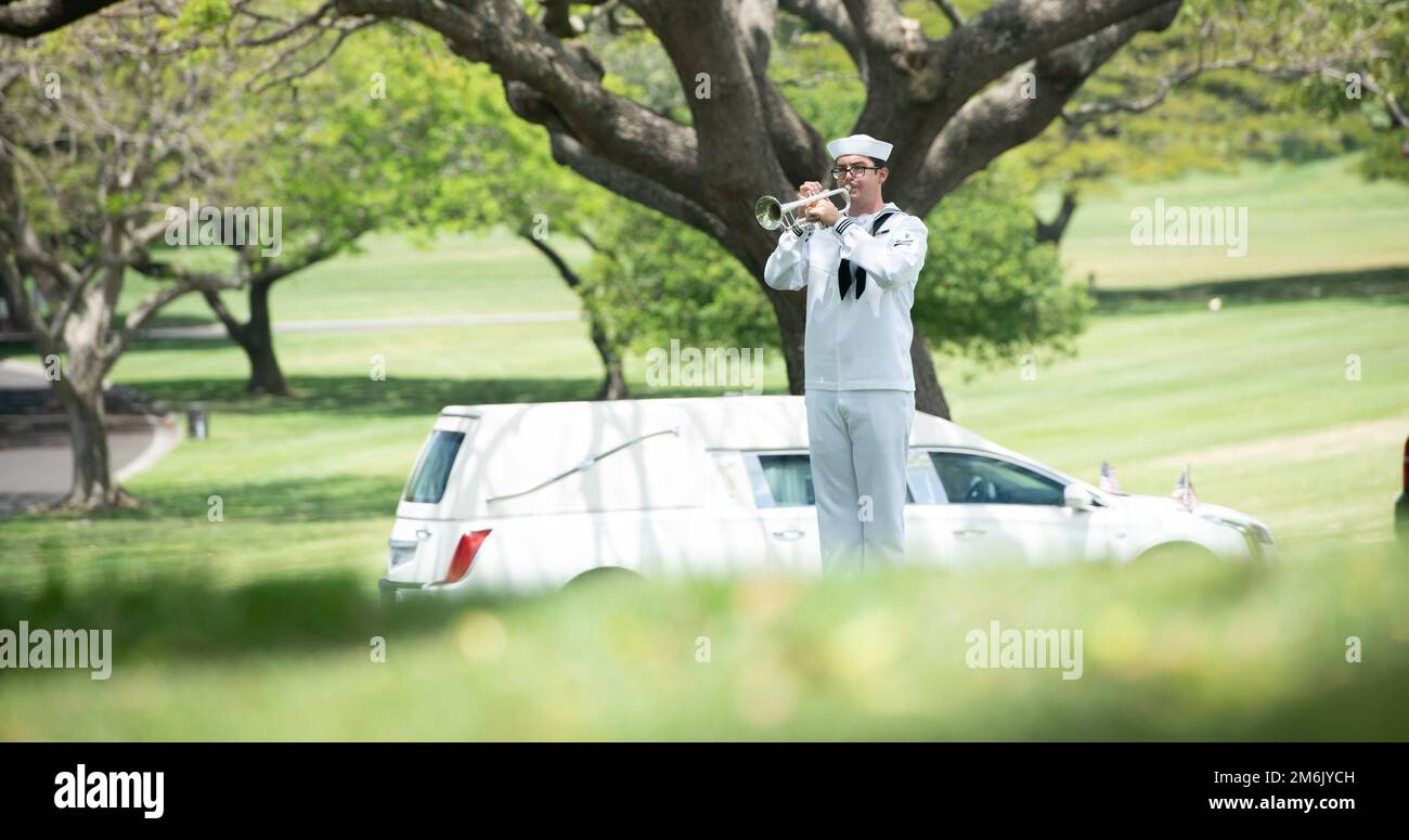 A U.S. Navy Bugler plays taps at U.S. Navy Seaman 2nd Class Walter R ...