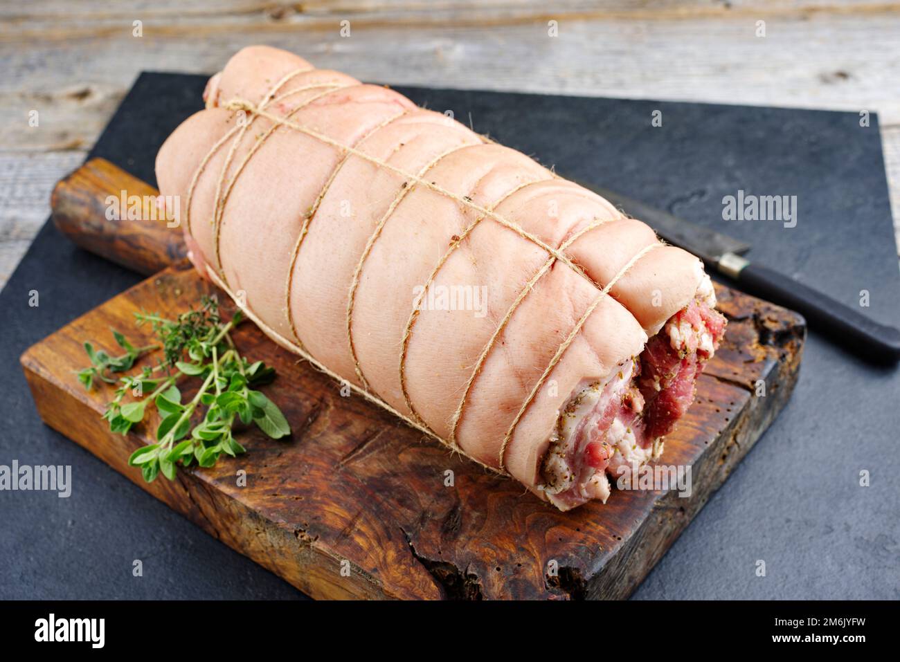Traditional Raw Filipino Lechon Kawali Pork Belly Roll Meat As Piece And Bounded With Herbs