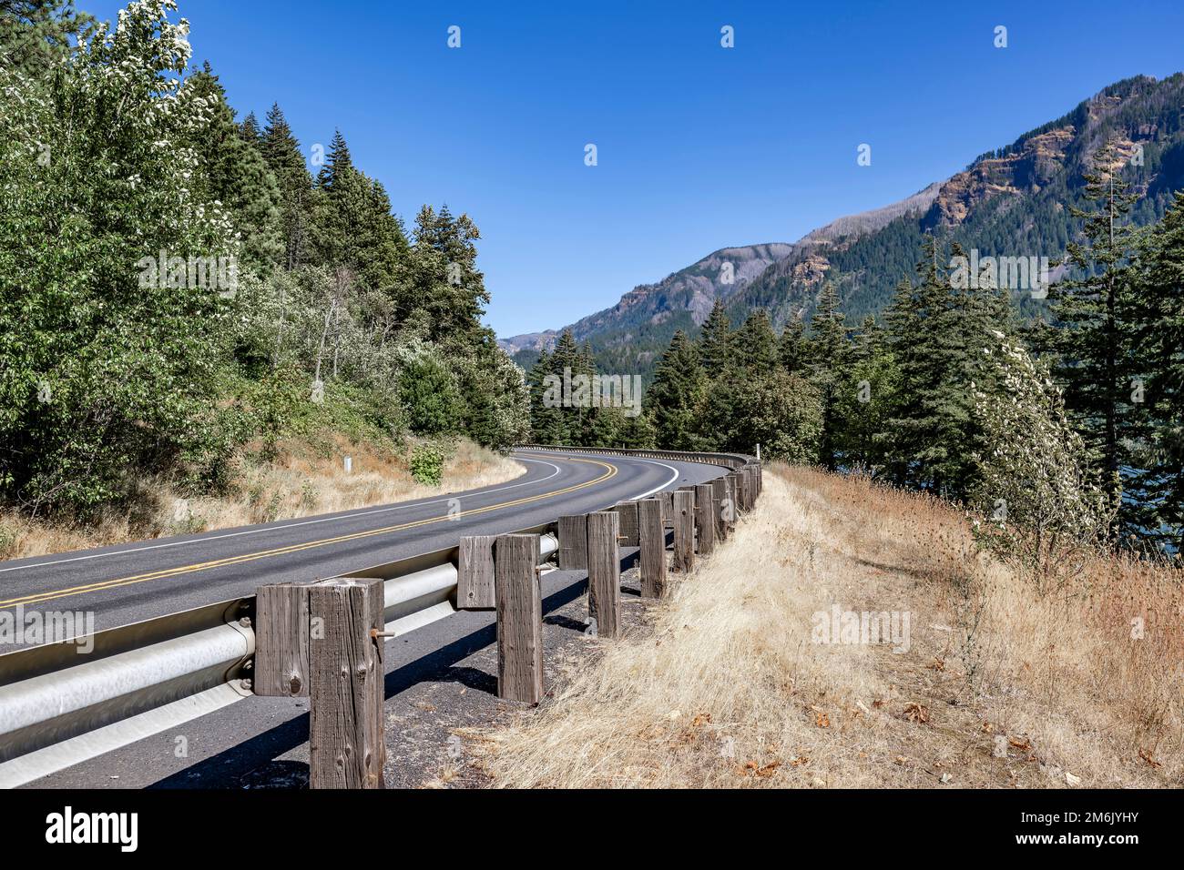 Scenic summer landscape with a winding mountain highway road with ...