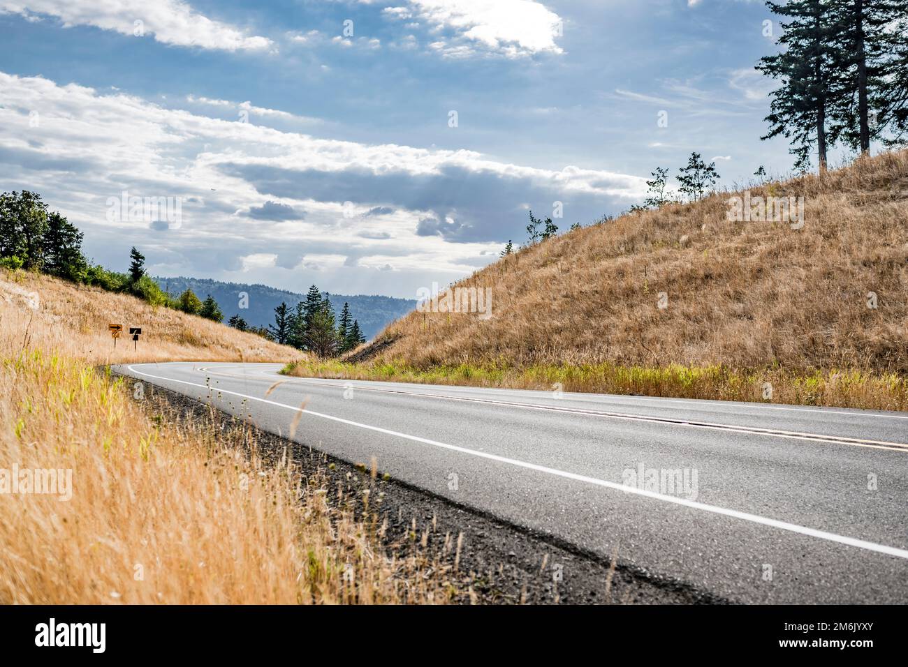 Scenic summer landscape with a winding mountain highway road with ...