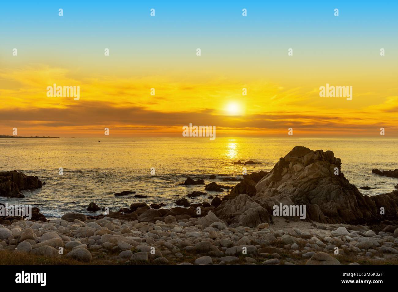 A golden sunset from the coast of Monterey Bay in California Stock ...