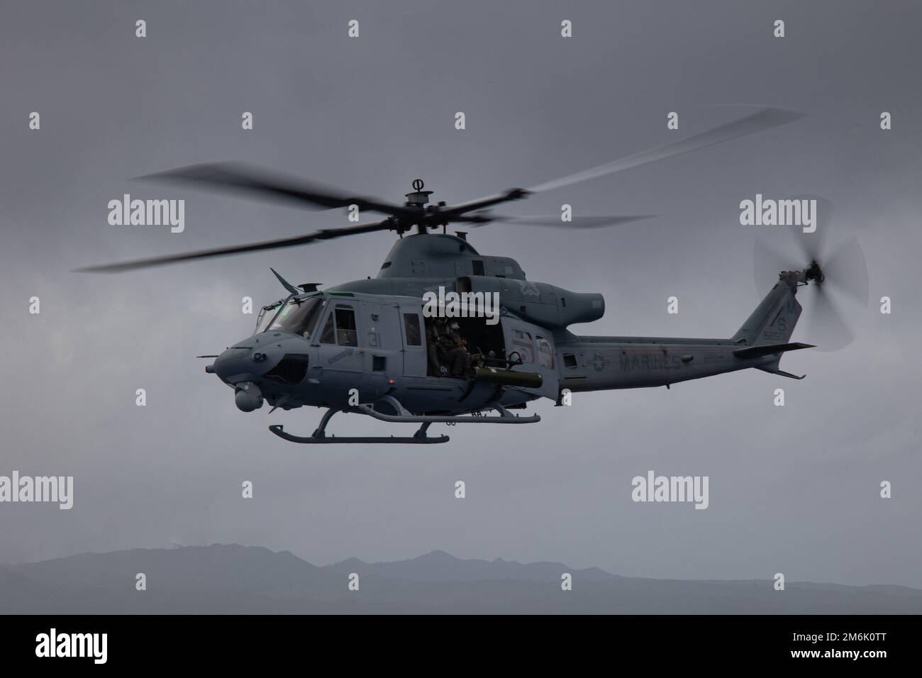 A U.S. Marine Corps UH-1Y Venom helicopter with Marine Light Attack ...
