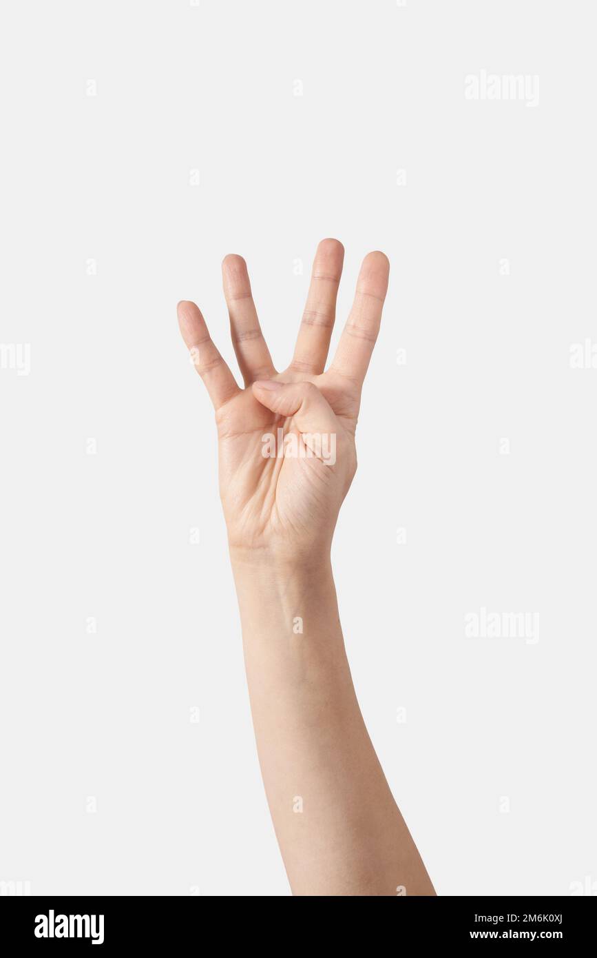 Counting on fingers, four inner palm Stock Photo - Alamy