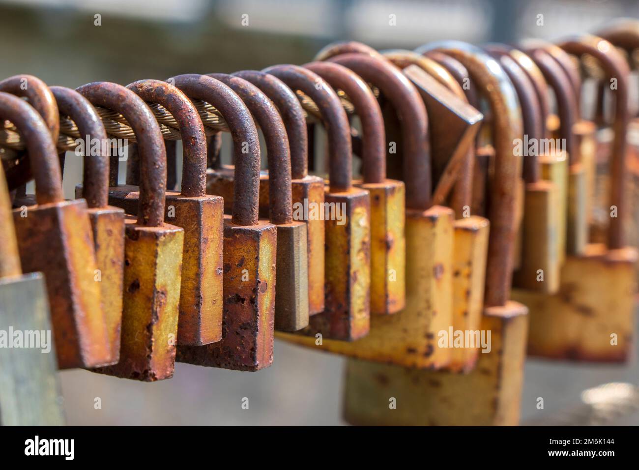 Love locks hang on the chain bridge in Bamberg Stock Photo - Alamy