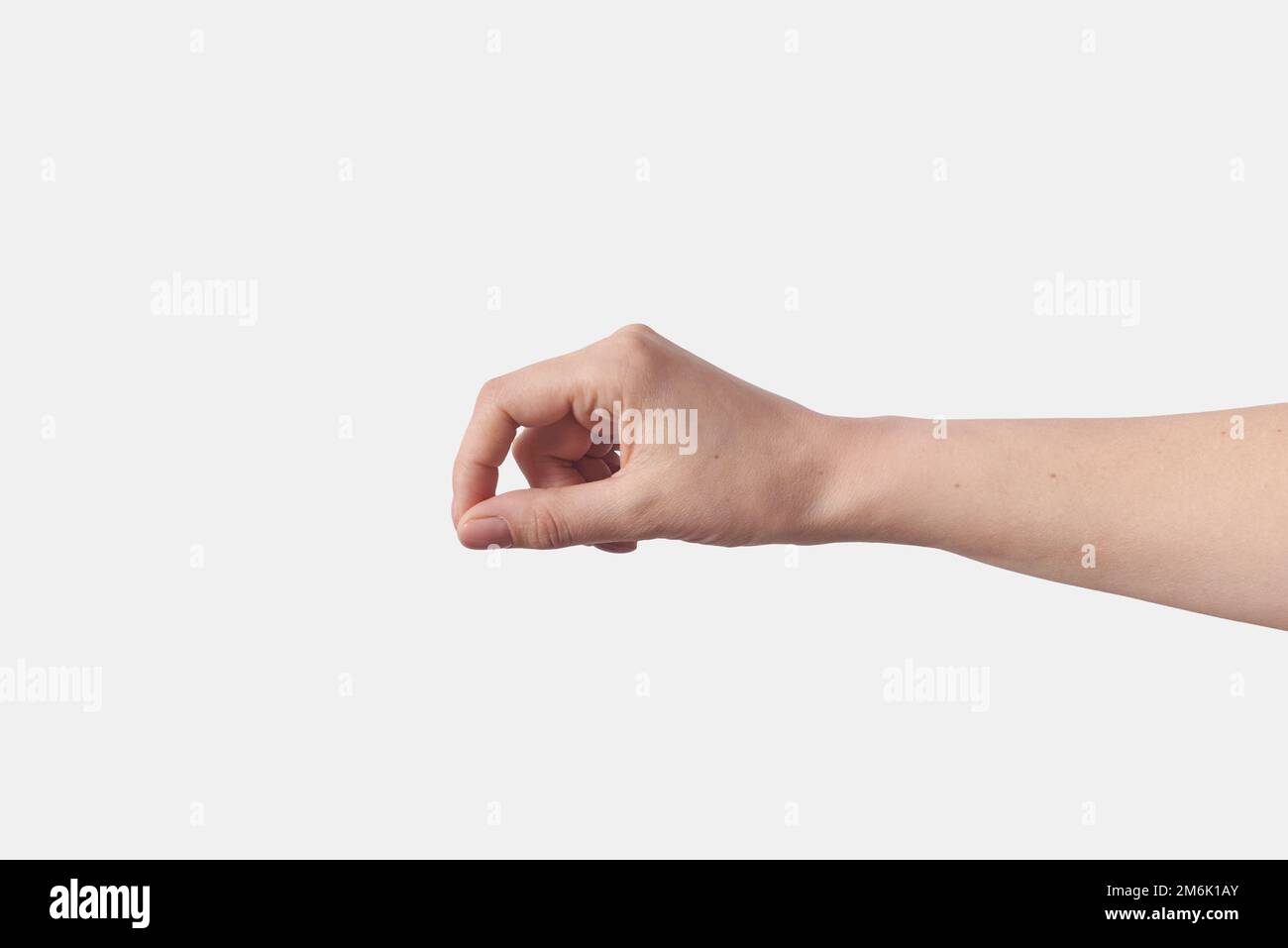 Invisible object holding hand isolated on white Stock Photo - Alamy