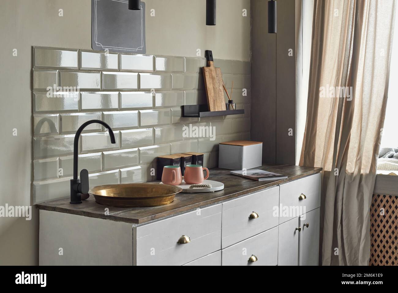 Elegant small kitchen with sink and counter at country house Stock ...
