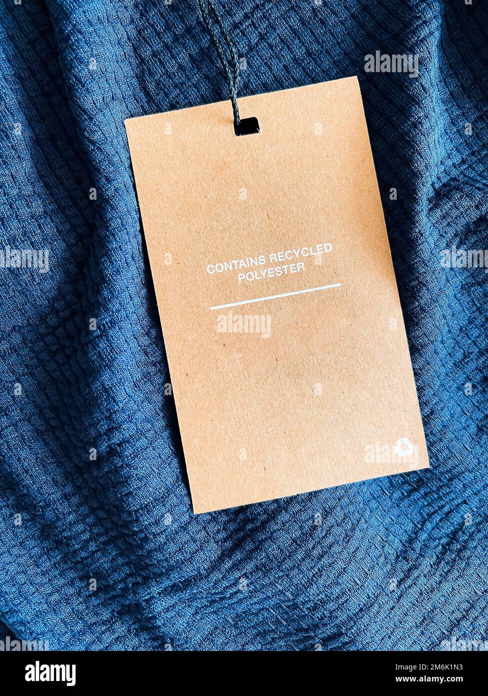 Contains recycled polyester fashion label tag, sale price card on ...