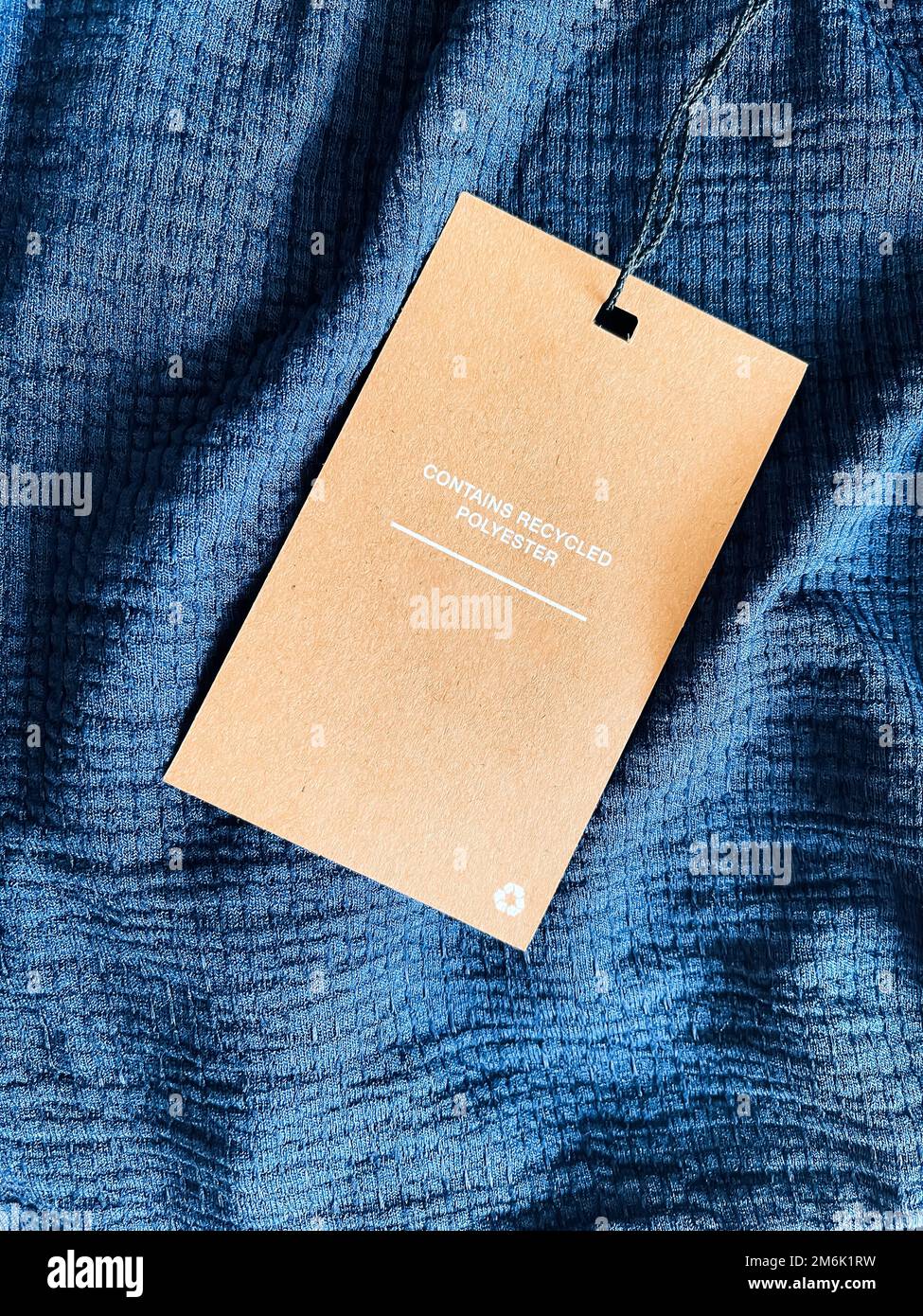 Contains recycled polyester fashion label tag, sale price card on ...