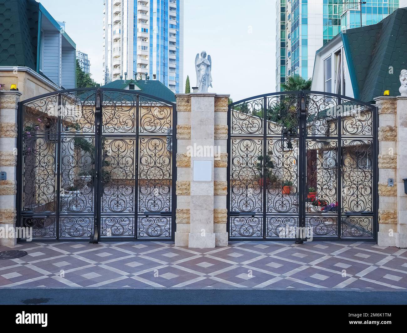 Ornate wrought iron gates hi-res stock photography and images - Alamy