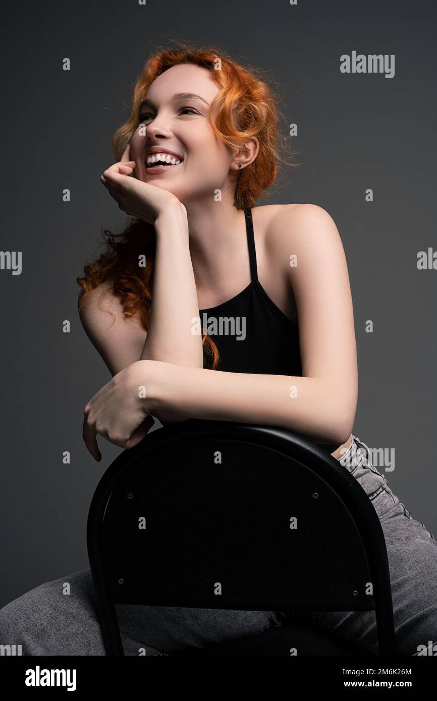 Leaning on hand hi-res stock photography and images - Alamy