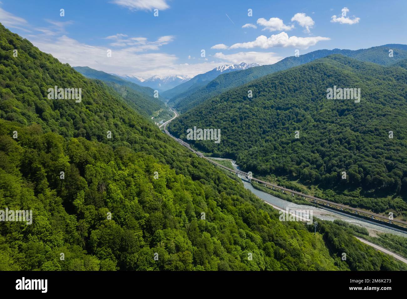 Aerial panorama landscape of highway road between mountains at sunny ...