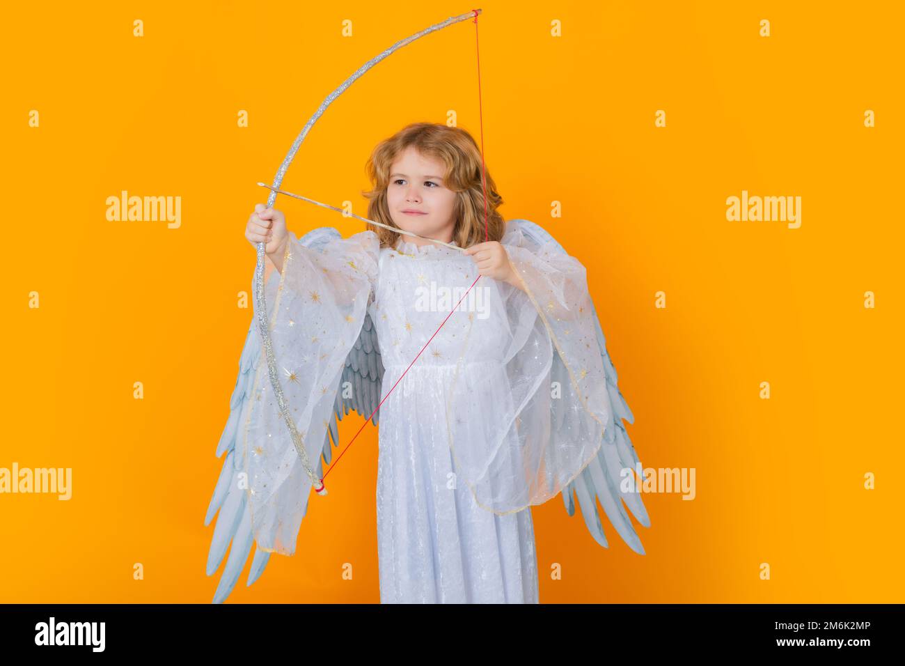 Angel with bow and arrow. Little angel. Portrait of cute kid with angel ...