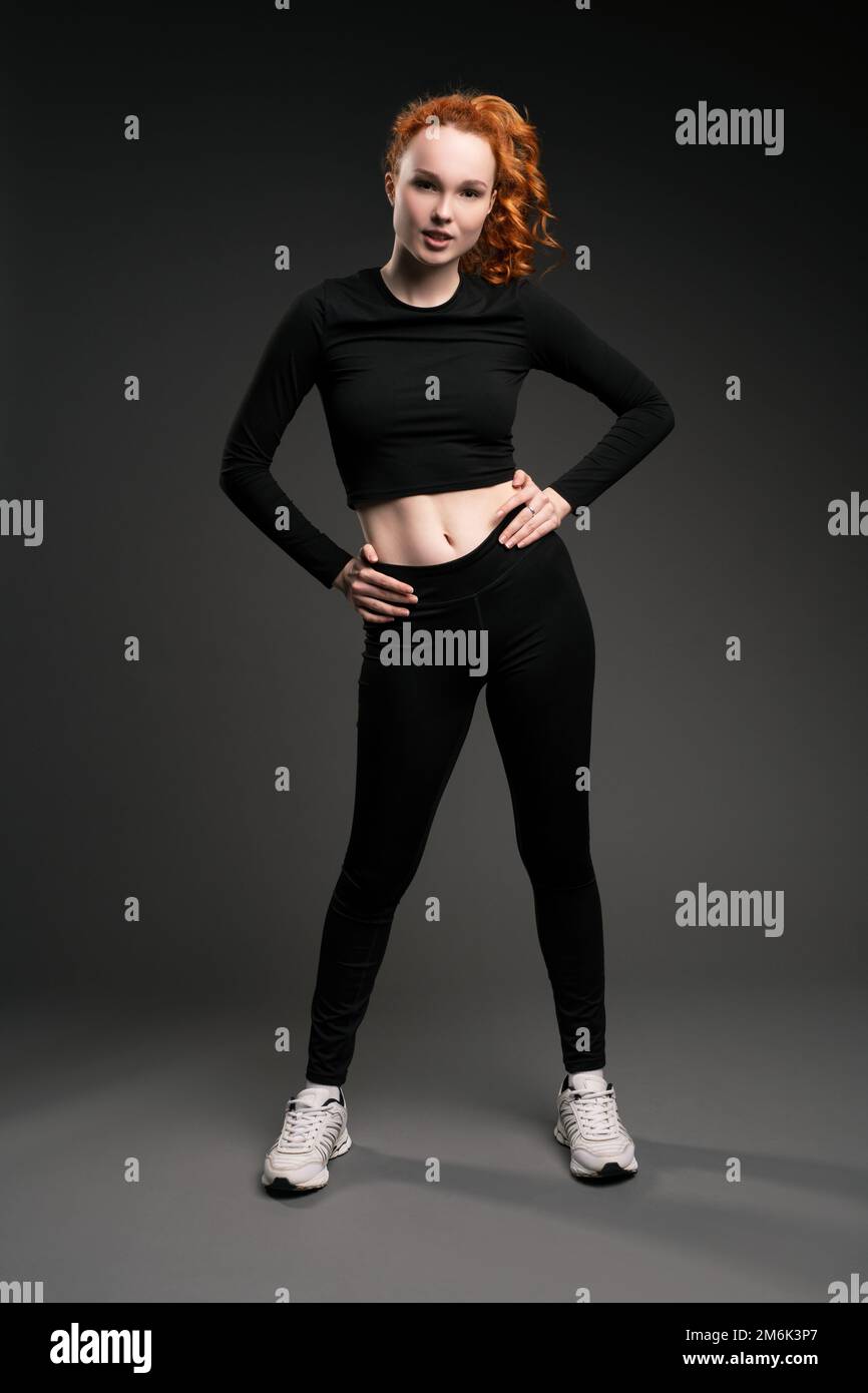 Woman standing hands on waist full body hi-res stock photography and ...