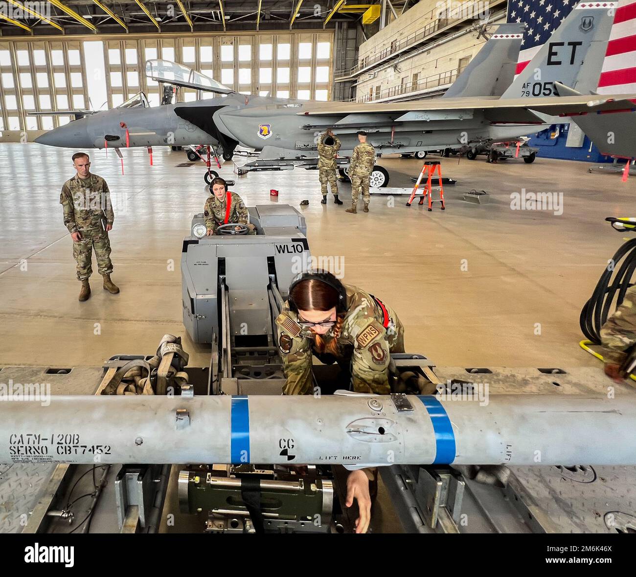 A 96th Aircraft Maintenance Squadron Red team prepares to move an AIM ...