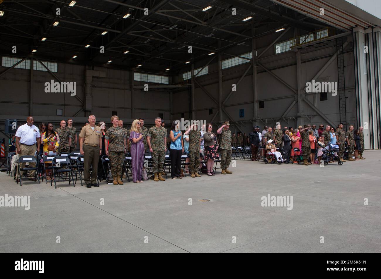 U.S. Marines, Sailors, and families salute the U.S. and Marine Corps ...