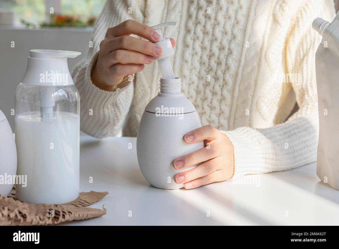 eco friendly habits hand gesture using refill containers Stock Photo ...