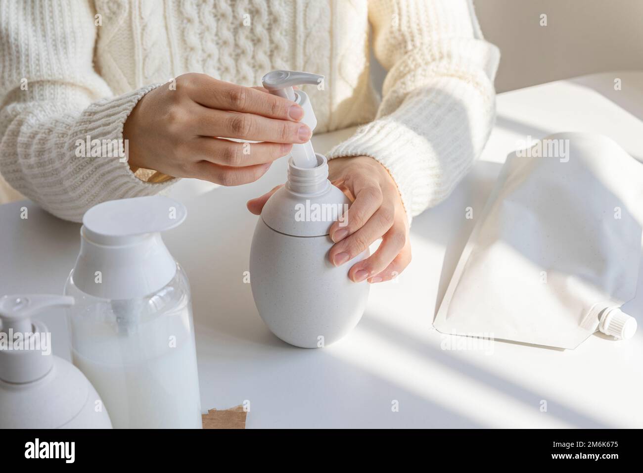 eco friendly habits hand gesture using refill containers Stock Photo ...