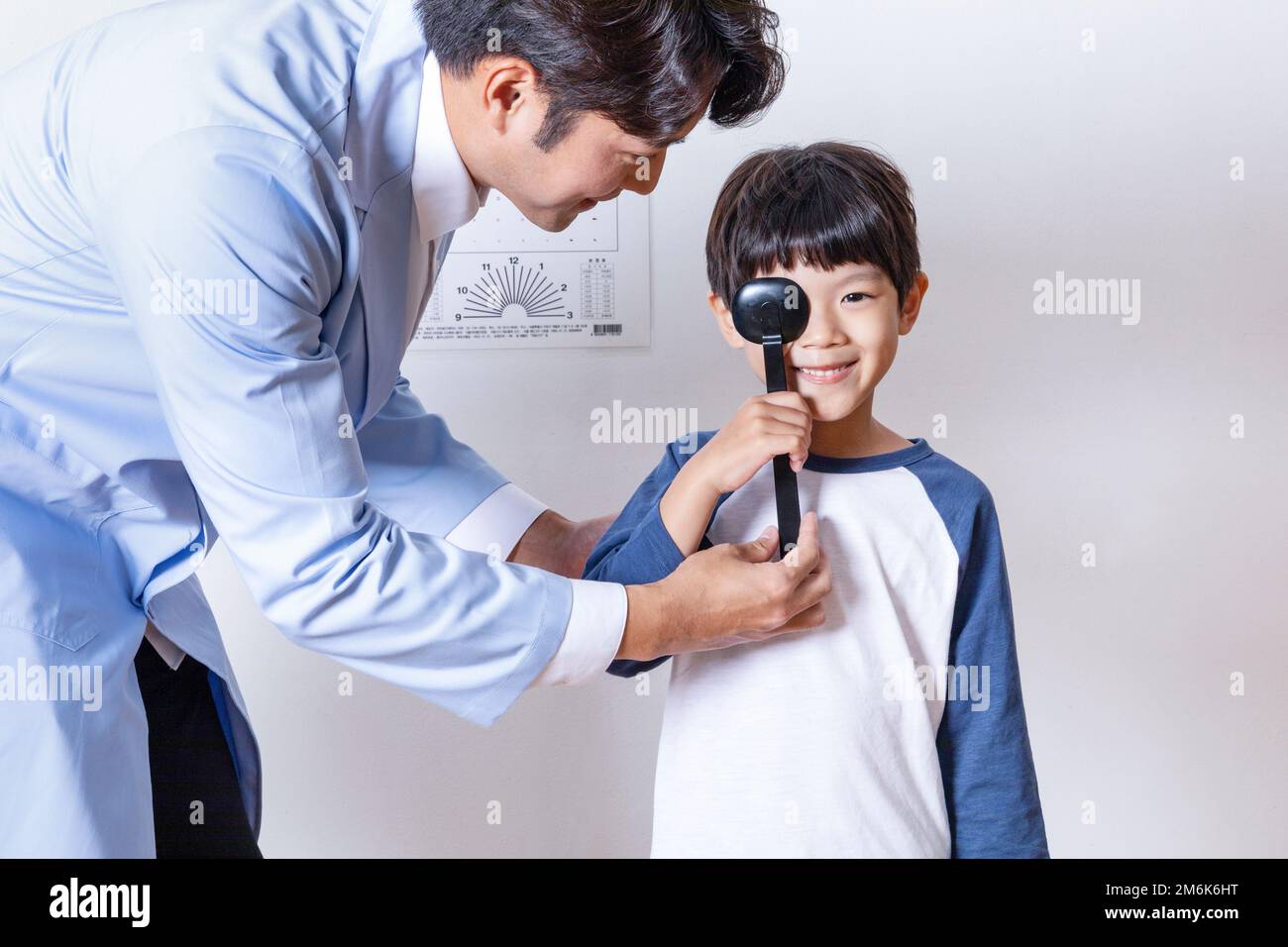 korean asian child in ophthalmic clinic eyesight test Stock Photo - Alamy