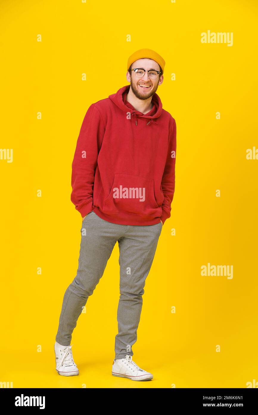 Full body handsome young man in casual wear, glasses with hands in ...