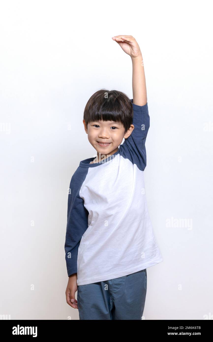 Asian Korean child measure one's height Stock Photo - Alamy