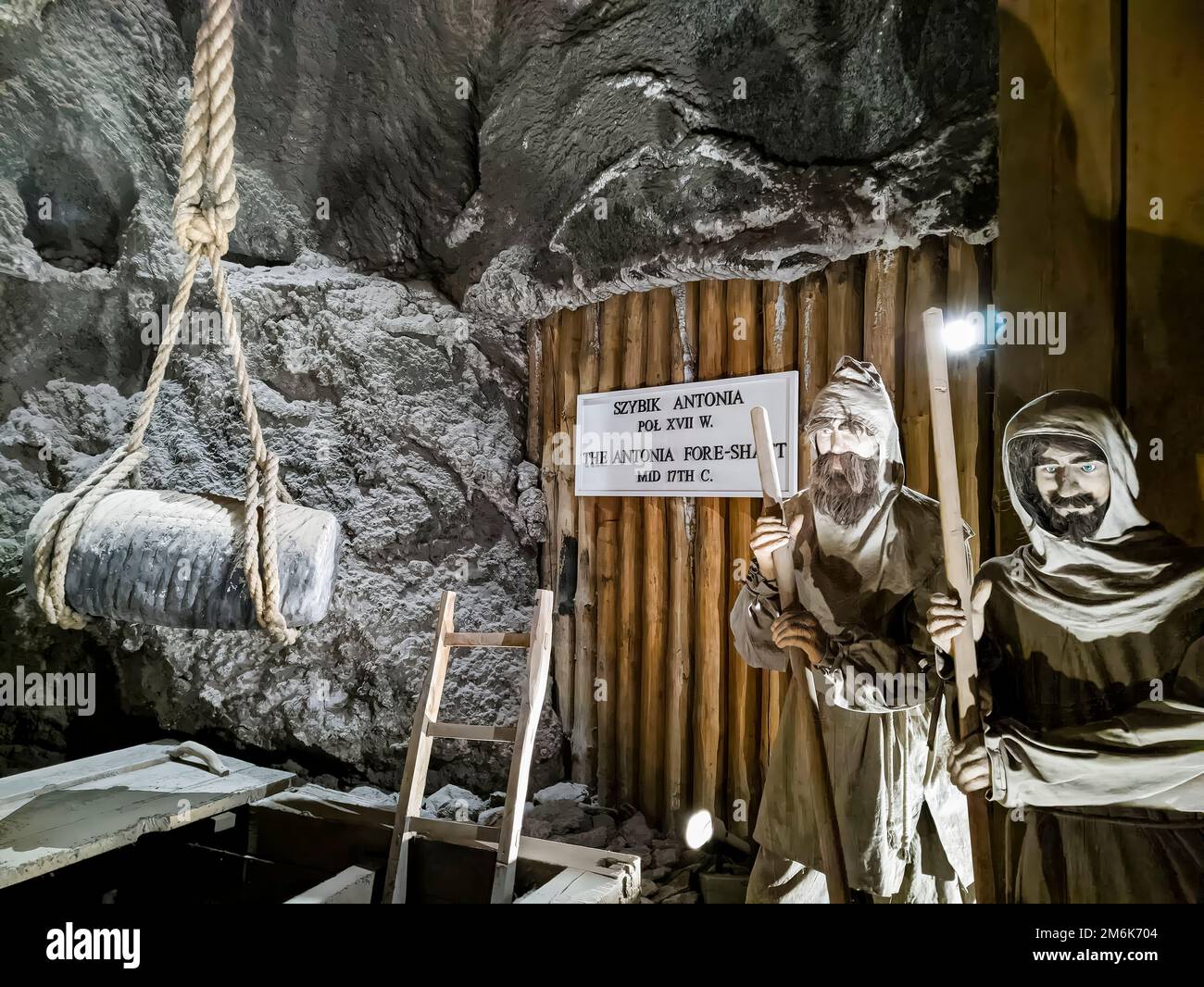 Figures of former miners. A scene from the Wieliczka Salt Mine. The ...