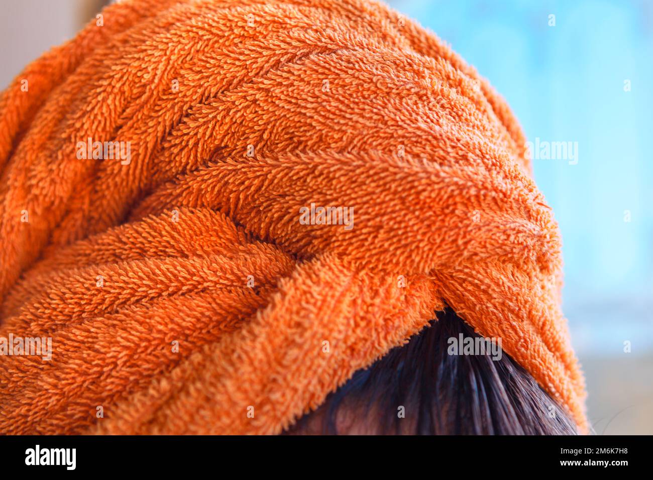 Towel wrapped around the head . Drying hair after bath Stock Photo - Alamy