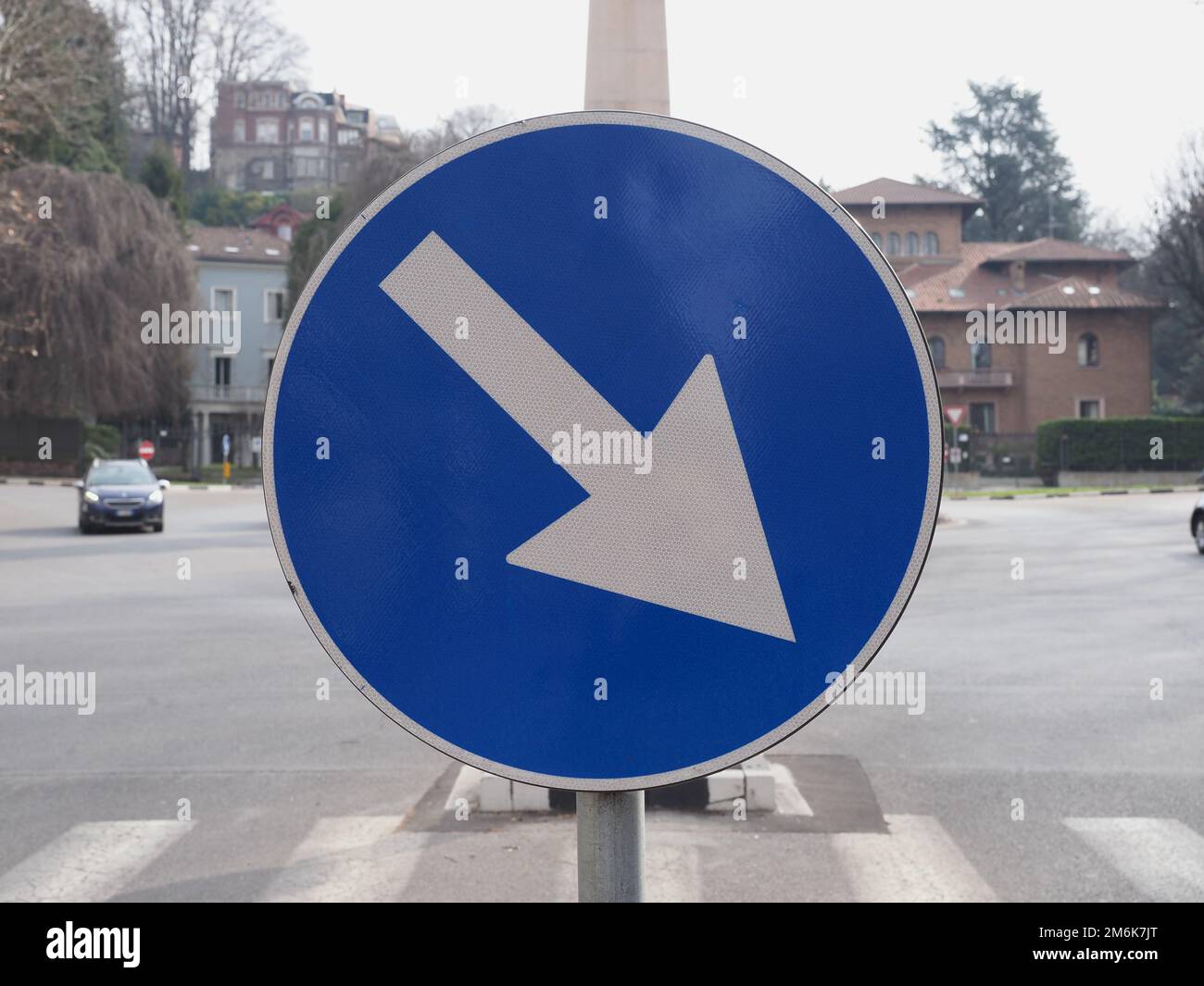 Direction arrow sign Stock Photo - Alamy