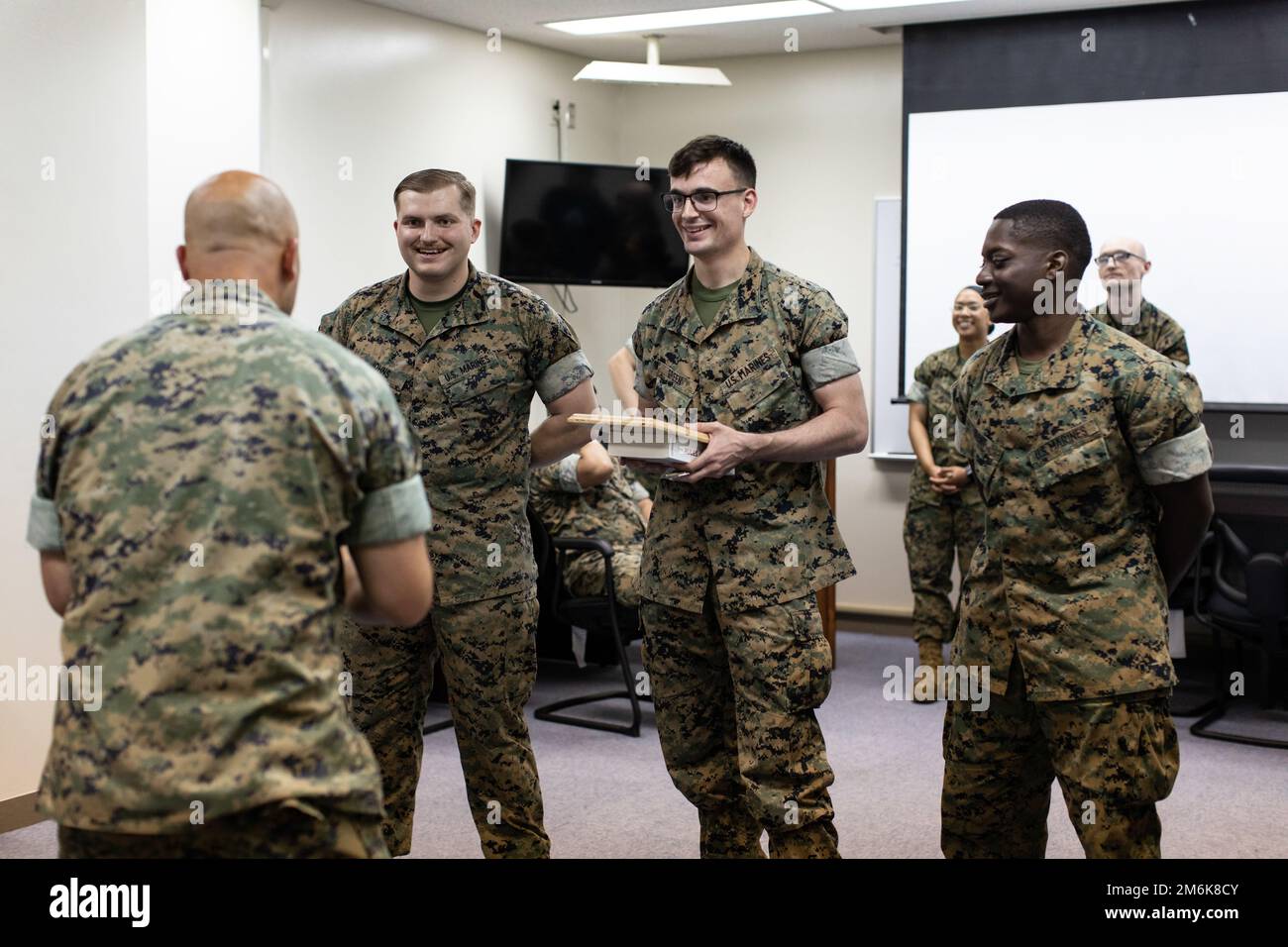 U.S. Marines Pfc. Kevin Kent, right to left, Lance Cpl. Ridge Green ...