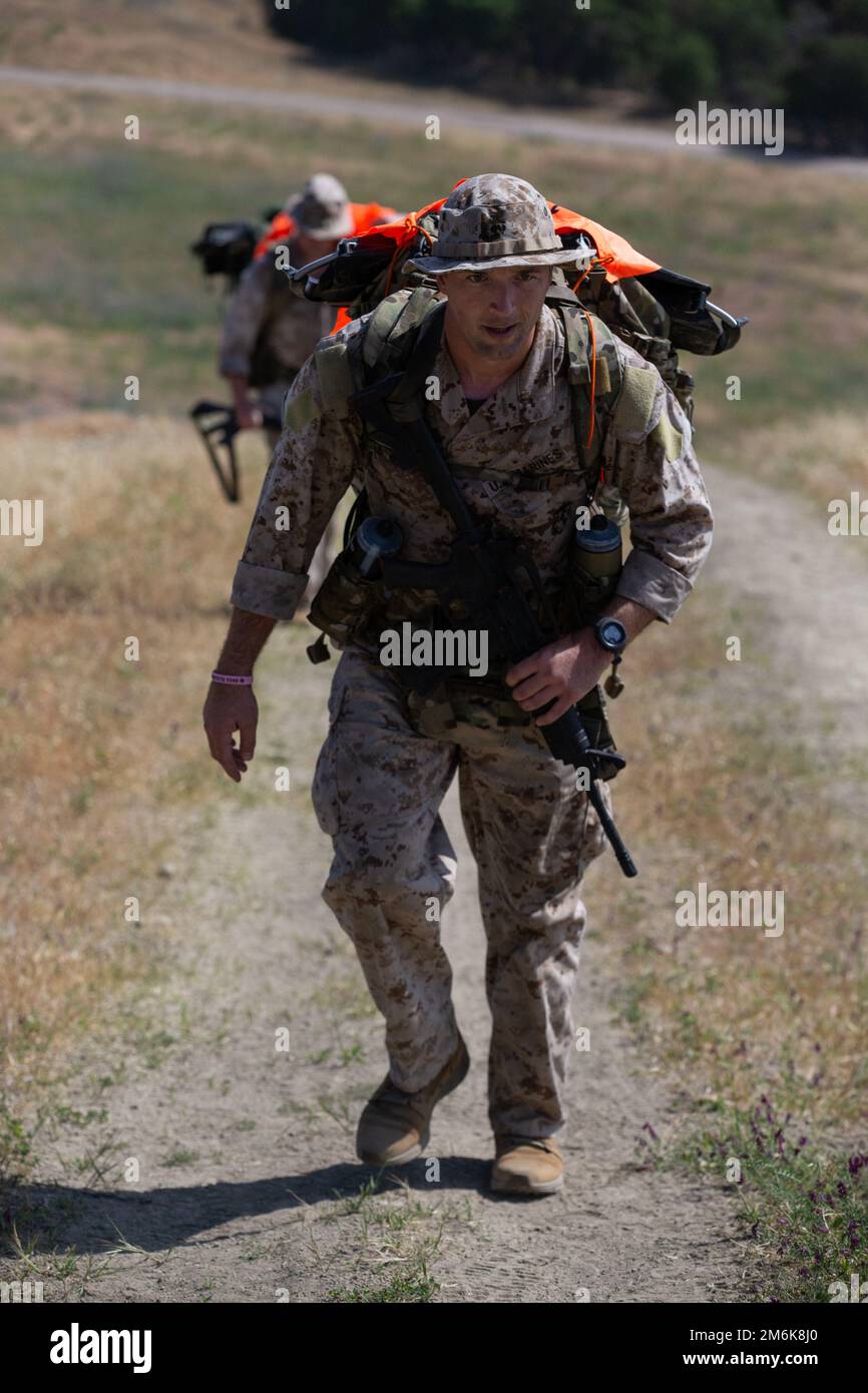 A U.S. Marine hikes off of Range 218 during the 13th Annual Recon ...