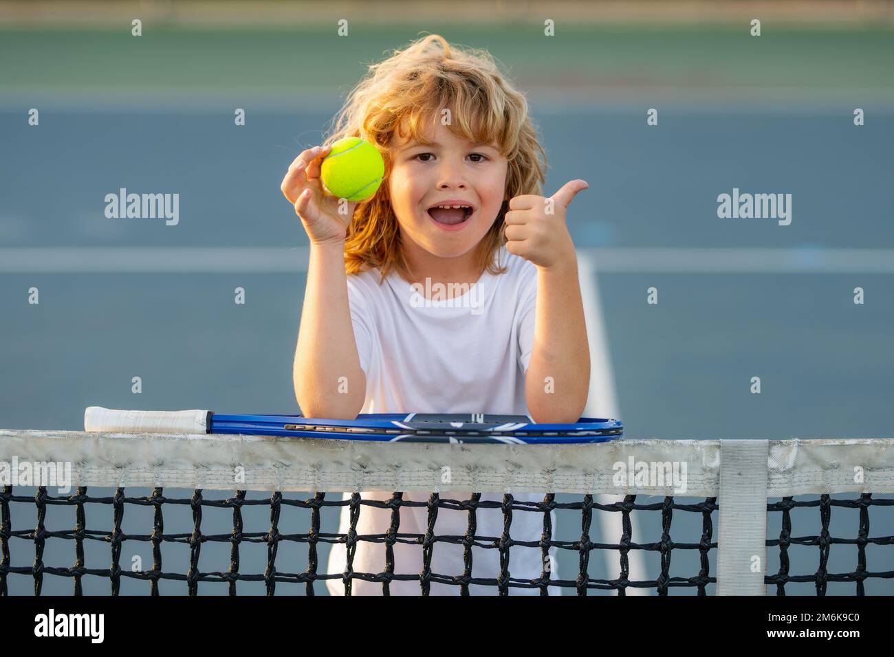 Tennis kids. Tennis child player on tennis court. Sport concept Stock ...