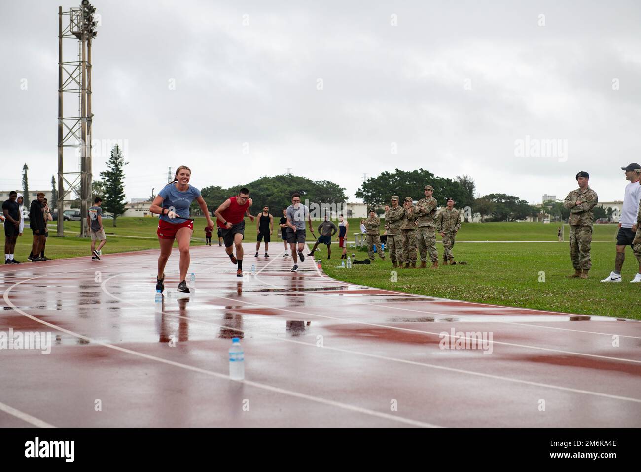 Airmen from the 18th Wing begin a relay race during the first annual ...