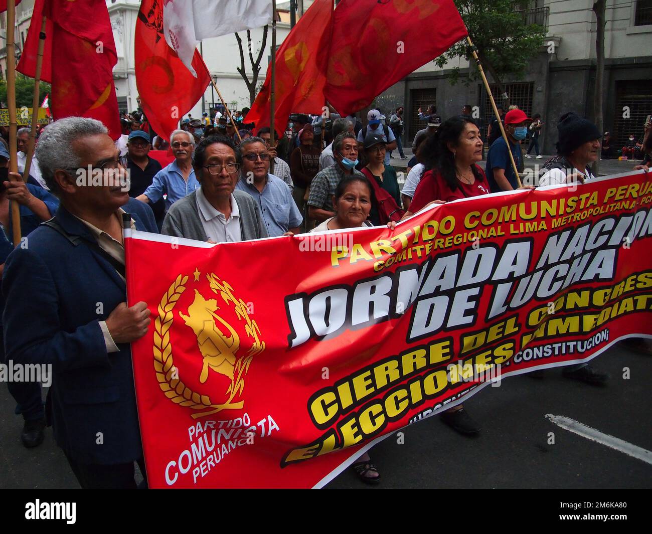 Members of the Peruvian Communist Party (PCP) protesting when hundreds ...