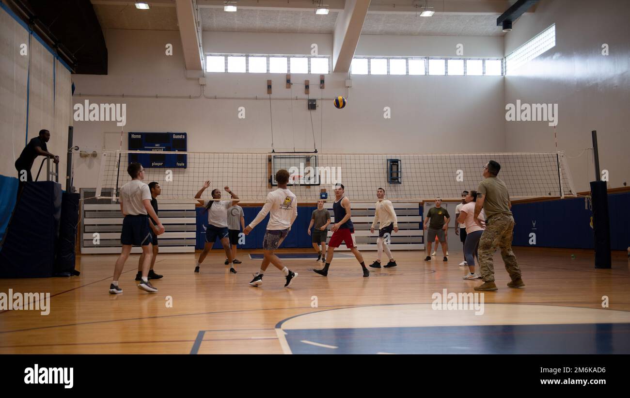 Airmen from the 18th Wing play volleyball during the first annual Dorm ...
