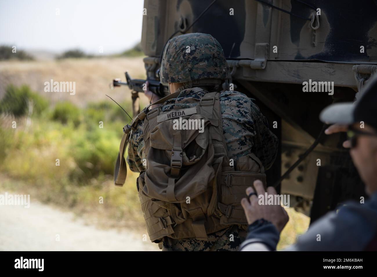 U.S. Marine Corps Lance Cpl. Cameron Weeda, a vehicle recovery operator ...