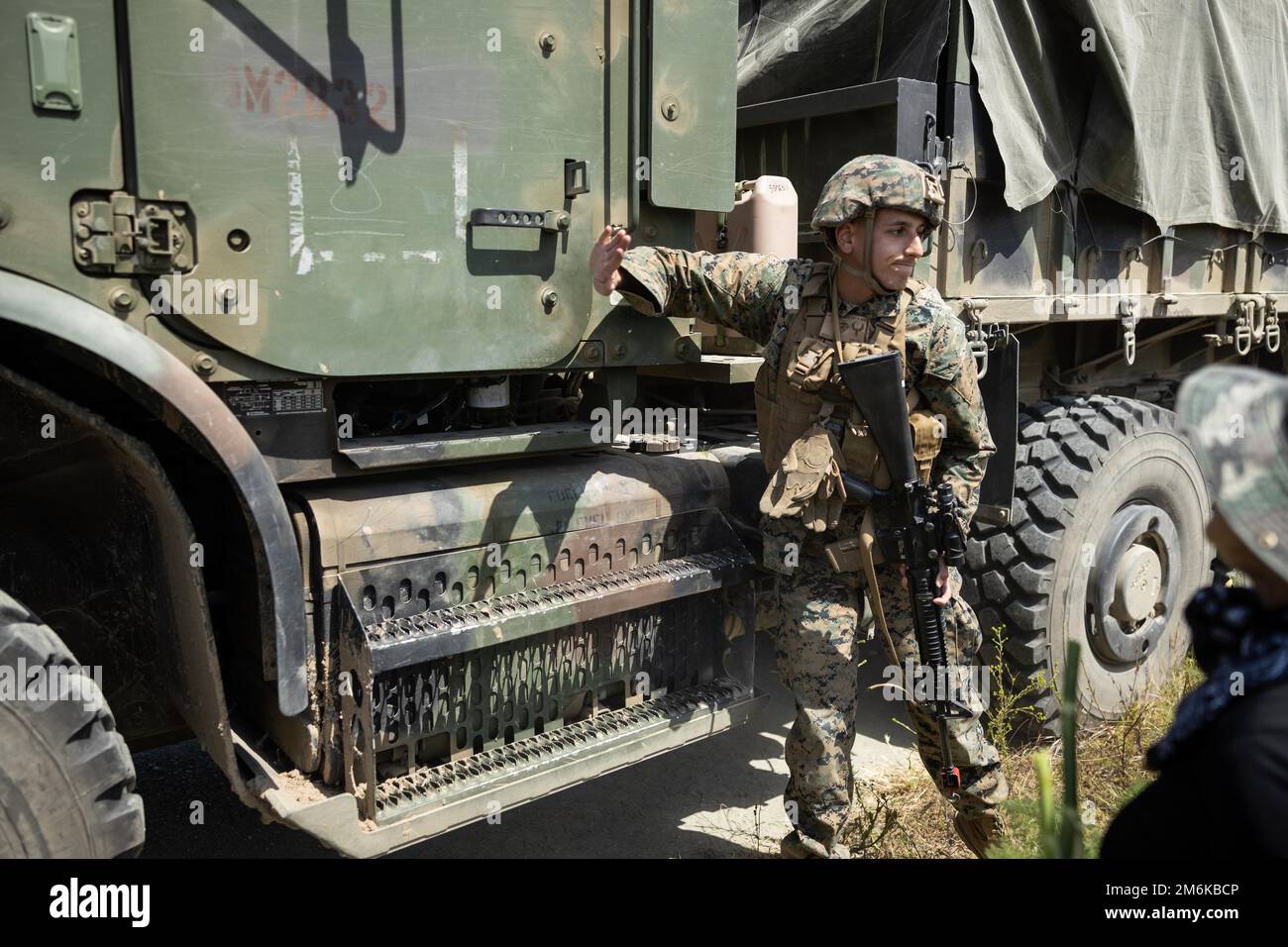 U.S. Marine Corps Lance Cpl. Cameron Weeda, a vehicle recovery operator ...