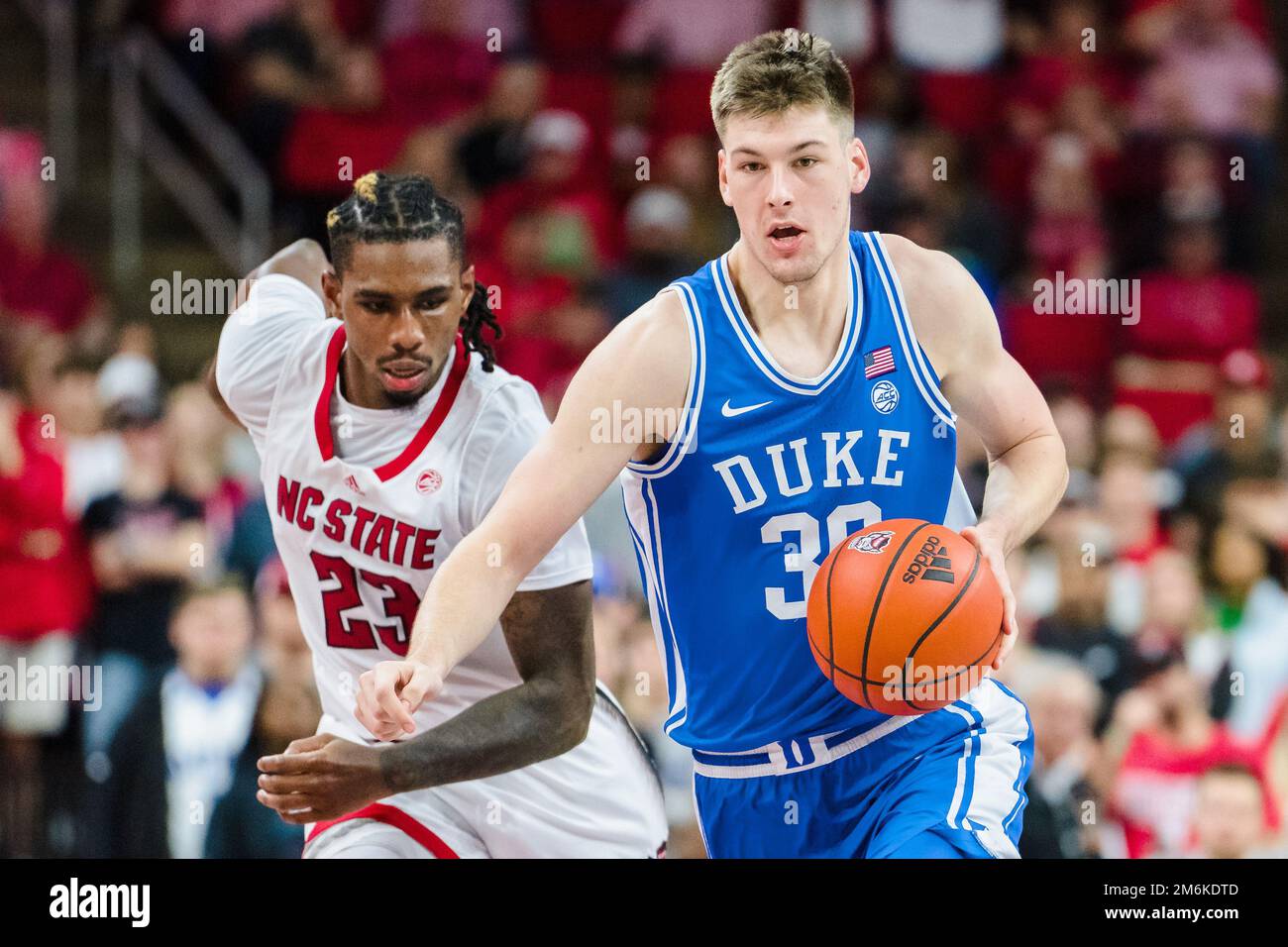 Duke Blue Devils center Kyle Filipowski (30) brings the ball up court ...