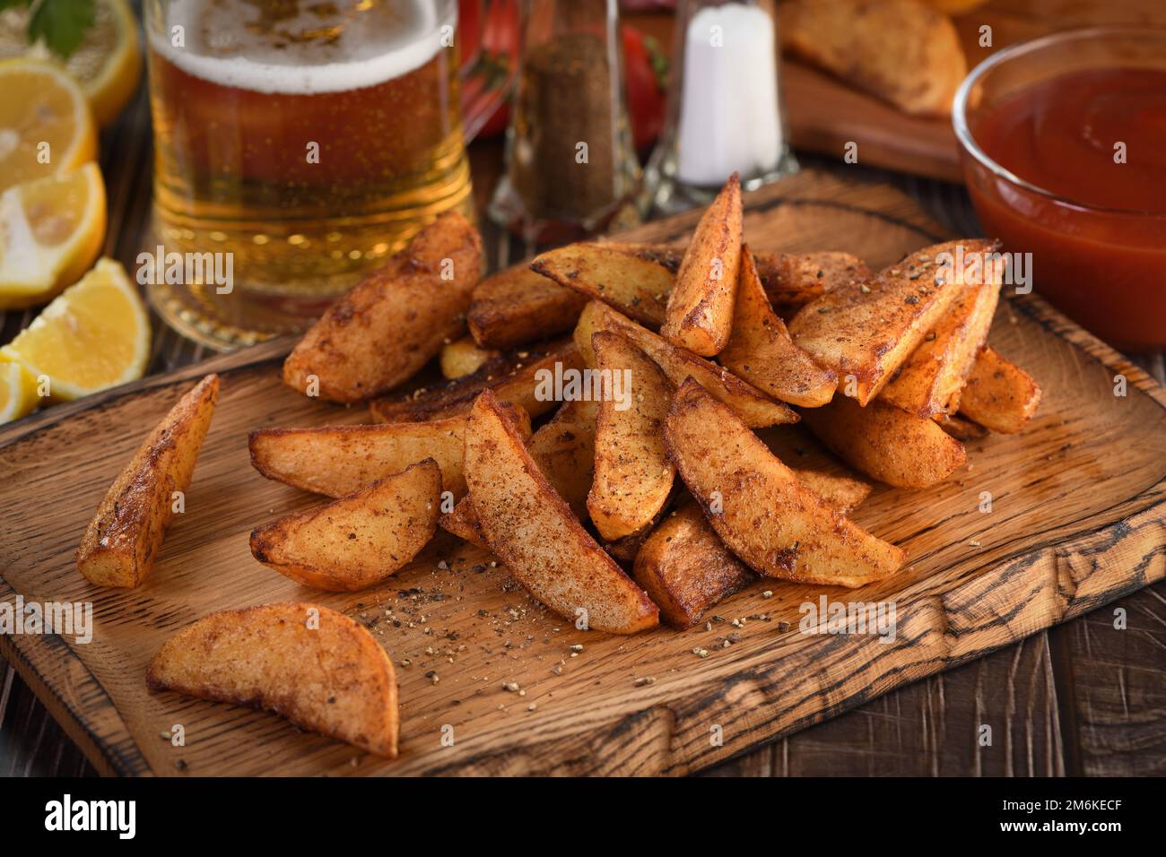 Rustic spicy fried potato slice Stock Photo - Alamy